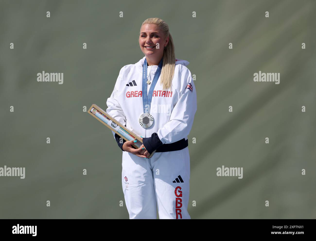 Great Britain's Amber Rutter with the silver medal after finishing ...