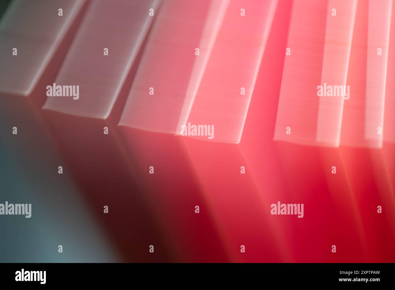 Blocks of red motion blur shapes created from paper during long ...