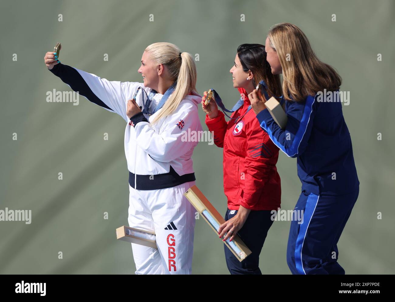 Great Britain's Amber Rutter (left) takes a photo with the silver medal ...