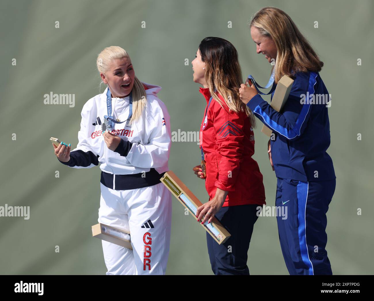 Great Britain's Amber Rutter (left) takes a photo with the silver medal ...