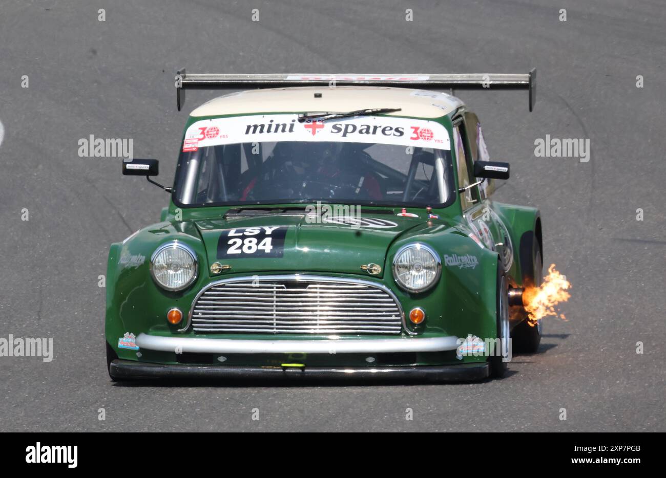 Driver Harvey Death (Green number 60) flare from his car during Track ...