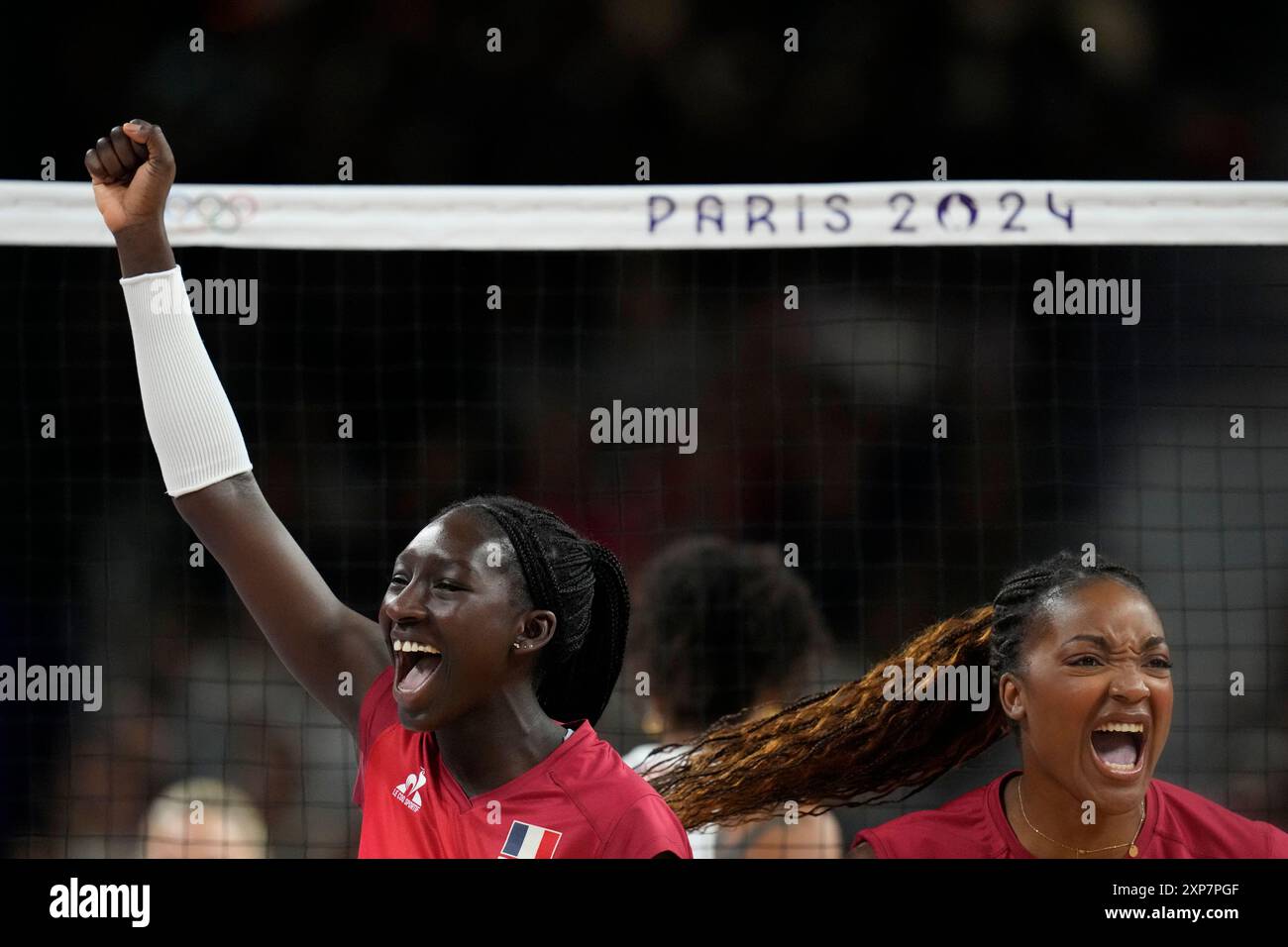 Halimatou Bah, left, and Amandha Sylves of France celebrate a point ...
