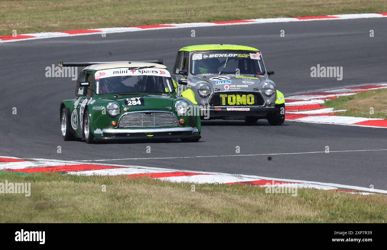 Driver Harvey (Dark Green number 60) and Driver Kane Astin (Light Grey ...