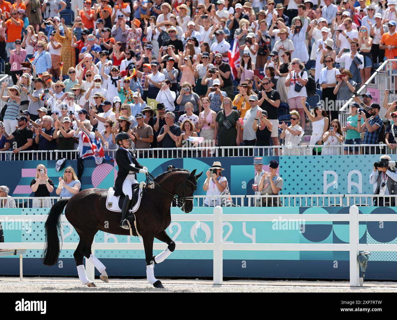 Versailles, France. 4th Aug, 2024. Isabell Werth of Germany riding ...
