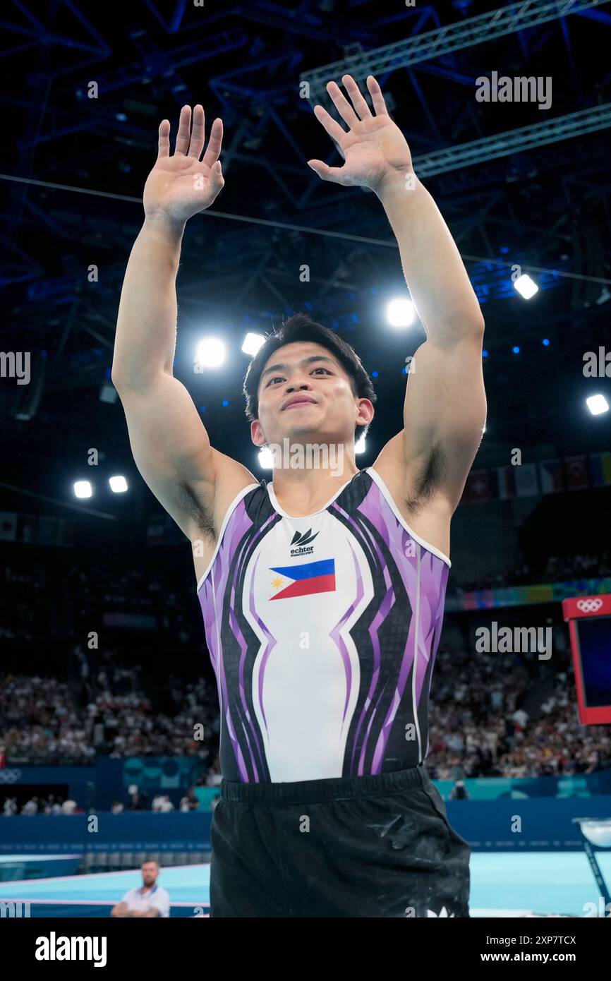 Carlos Edriel Yulo, of the Philippines, celebrates after winning the ...