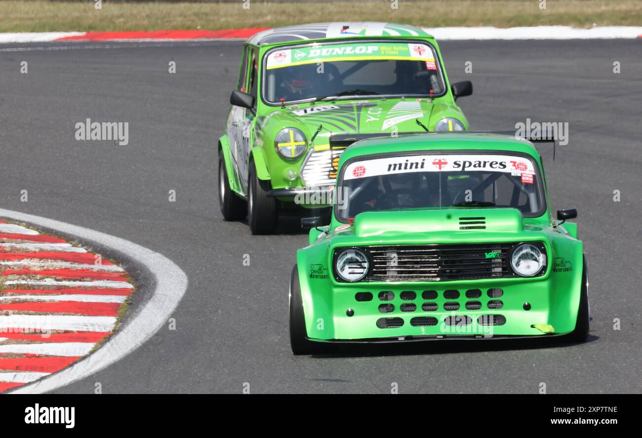 L-R Driver Neil McArthur(Dark Green Front number 19) and Driver Oliver ...