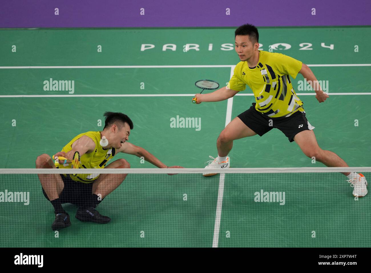 Taiwan's Lee Yang, right, and Wang Chi-Lin play against China's Liang ...