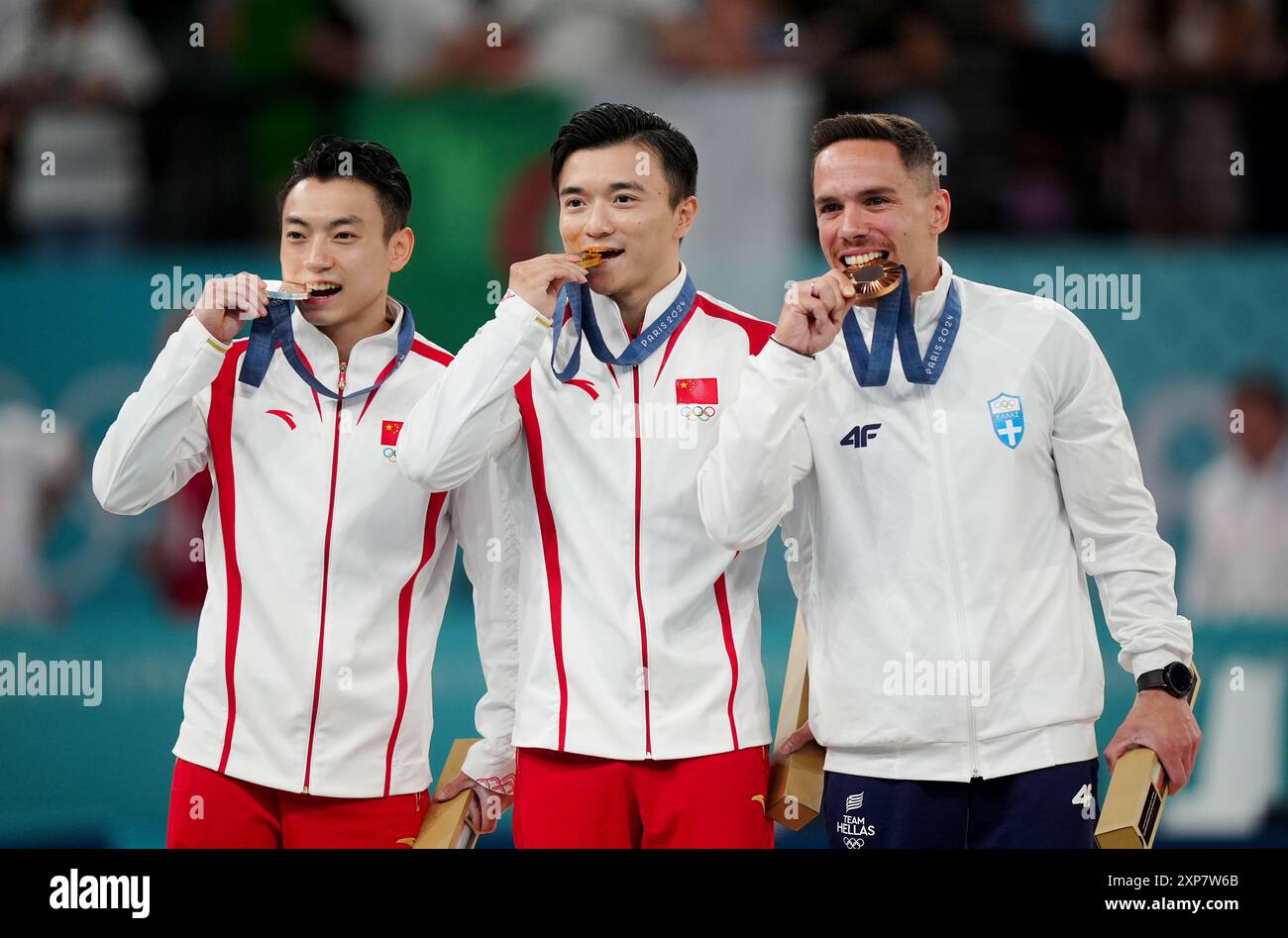 China's Liu Yang (centre) with the gold medal, alongside China's Zou ...