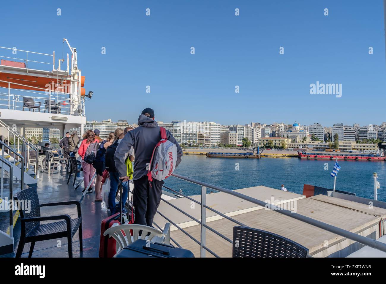 Ios, Greece - May 6, 2024 : View of a ferry boat preparing arriving at ...