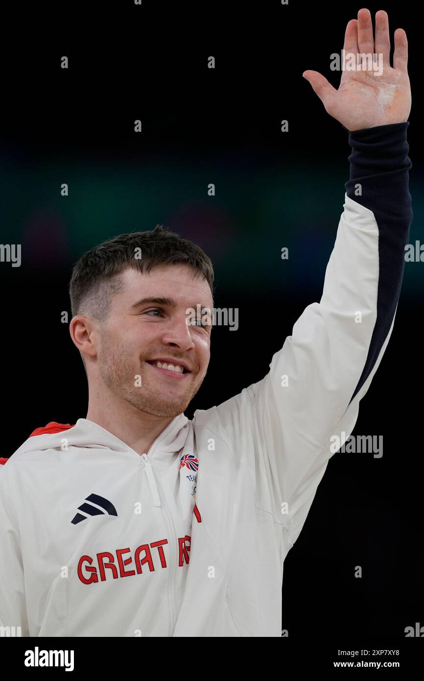 Harry Hepworth, of Britain, celebrates after winning the bronze medal ...