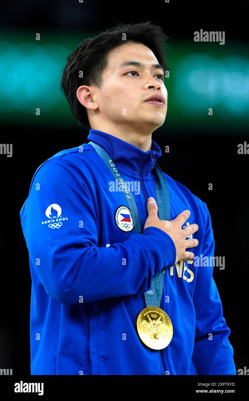 Carlos Edriel Yulo, of the Philippines, pauses on the podium for the ...