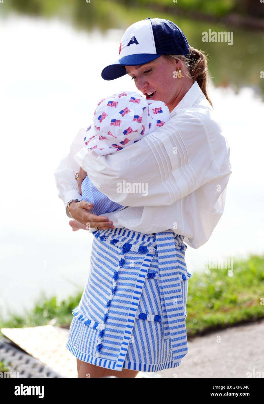 Meredith Scudder, wife of Scottie Scheffler, cradles her son, Bennett ...