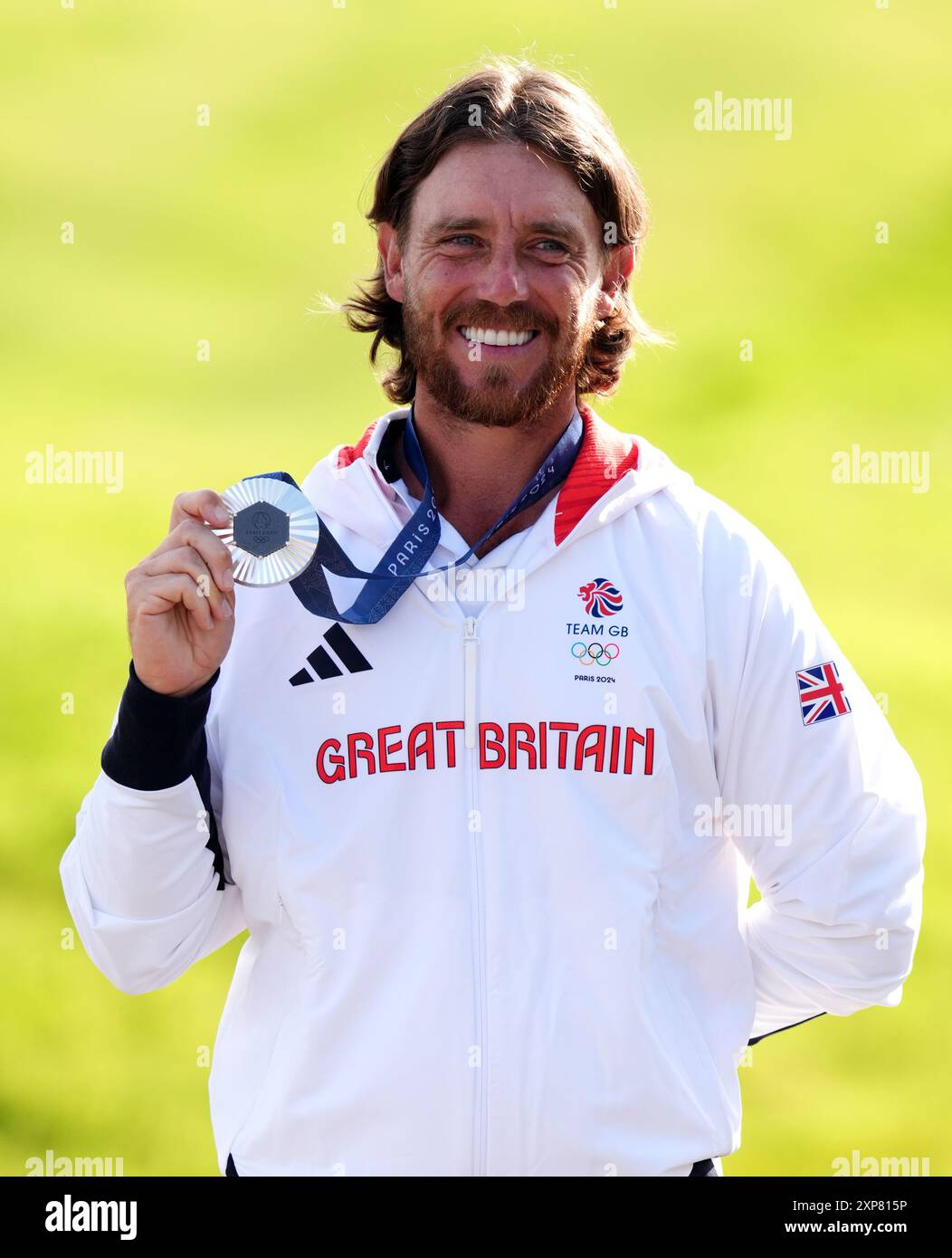 Great Britain's Tommy Fleetwood with his silver medal following the Men ...