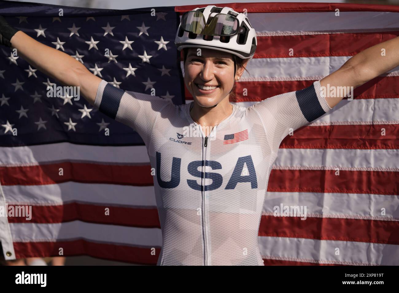 Kristen Faulkner, of the United States, celebrates winning the women's ...