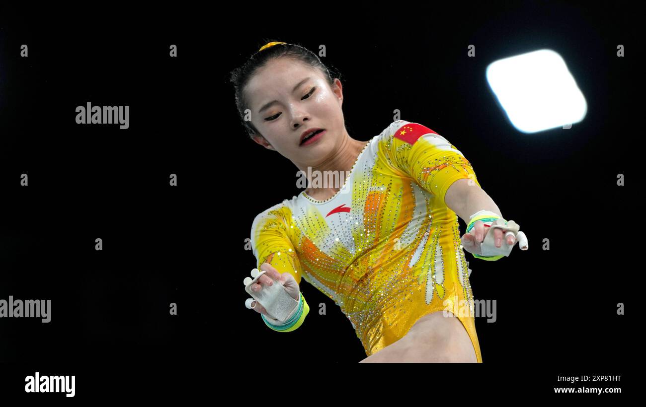 Zhang Yihan, of China, competes during the women's artistic gymnastics ...