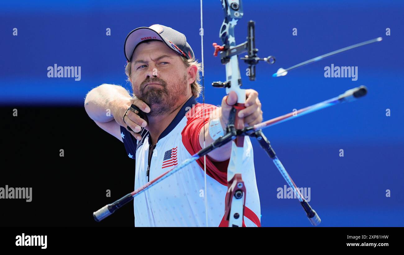 Brady Ellison of the United States releases his arrow in the men's ...