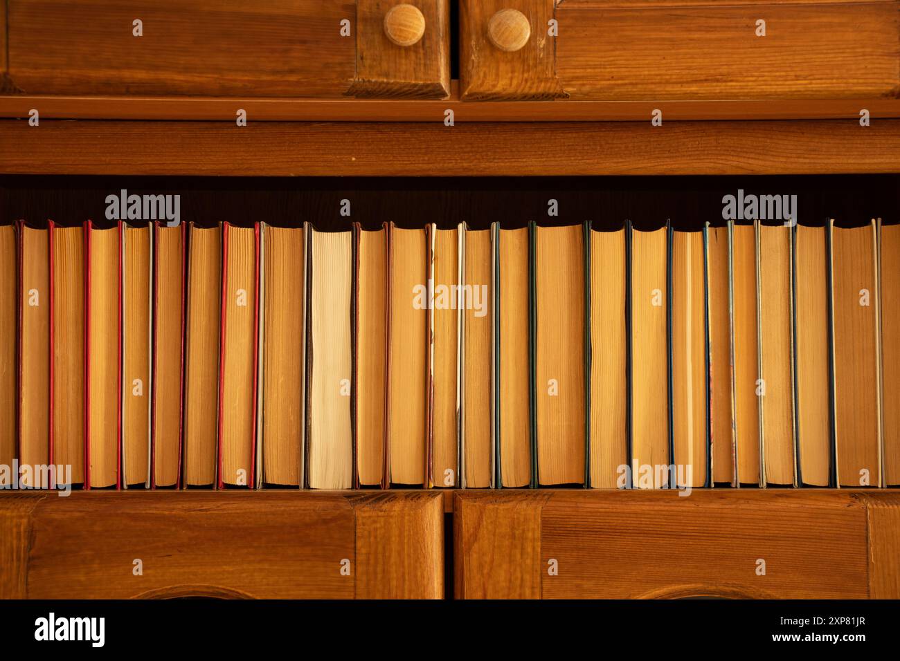 Bookshelf with old books in wooden cabinet at home,many books Stock ...
