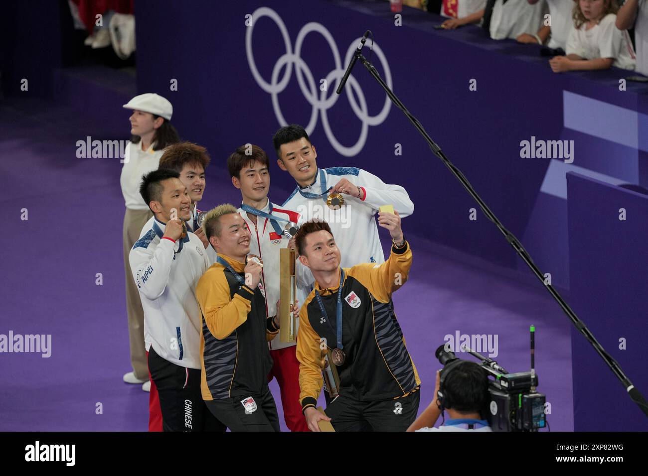 Medalists, Malaysia's Aaron Chia and Soh Wooi Yik, bronze, front, China ...