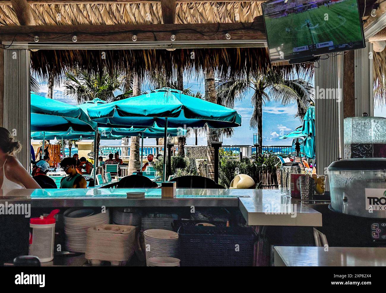 The view from a seat at a beach resort Tiki bar Stock Photo - Alamy