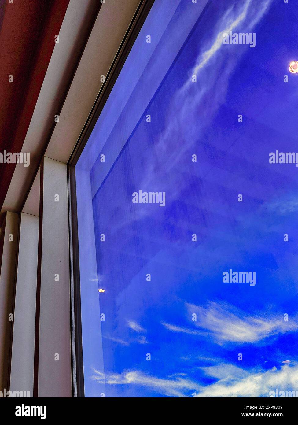 The view of a beautiful blue sky through a picture window Stock Photo ...