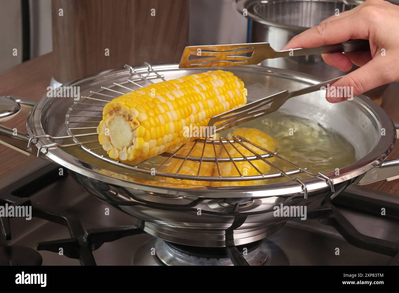 Woman fresh corn cobs hi-res stock photography and images - Alamy