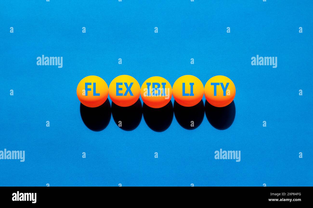 Flexibility symbol. Concept word Flexibility on beautiful yellow ping ...