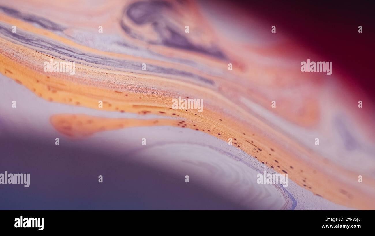 Color foam spill. Ink mix. Defocused purple yellow liquid grain texture ...