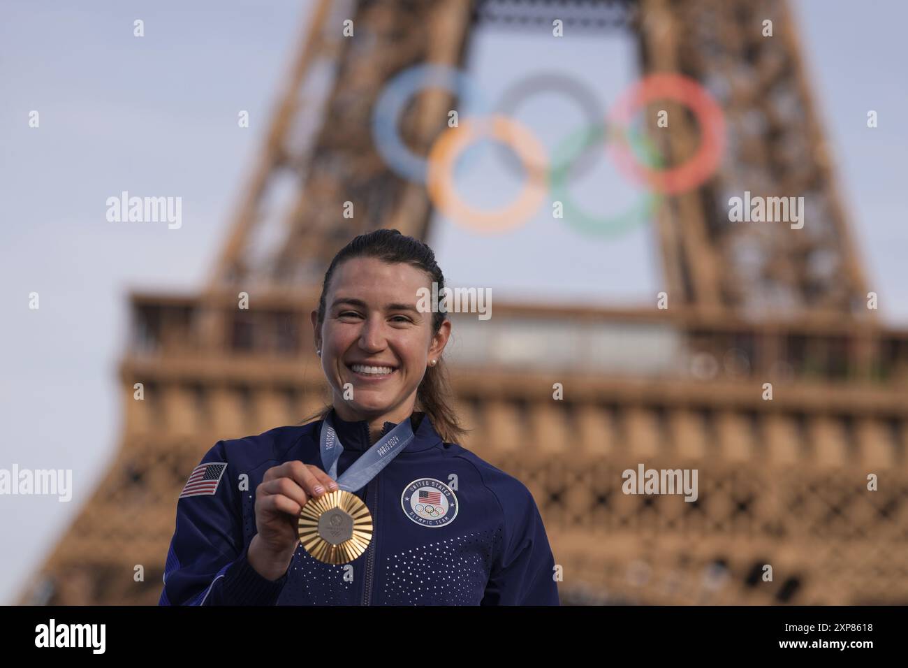 Kristen Faulkner, of the United States, poses with the gold medal of ...