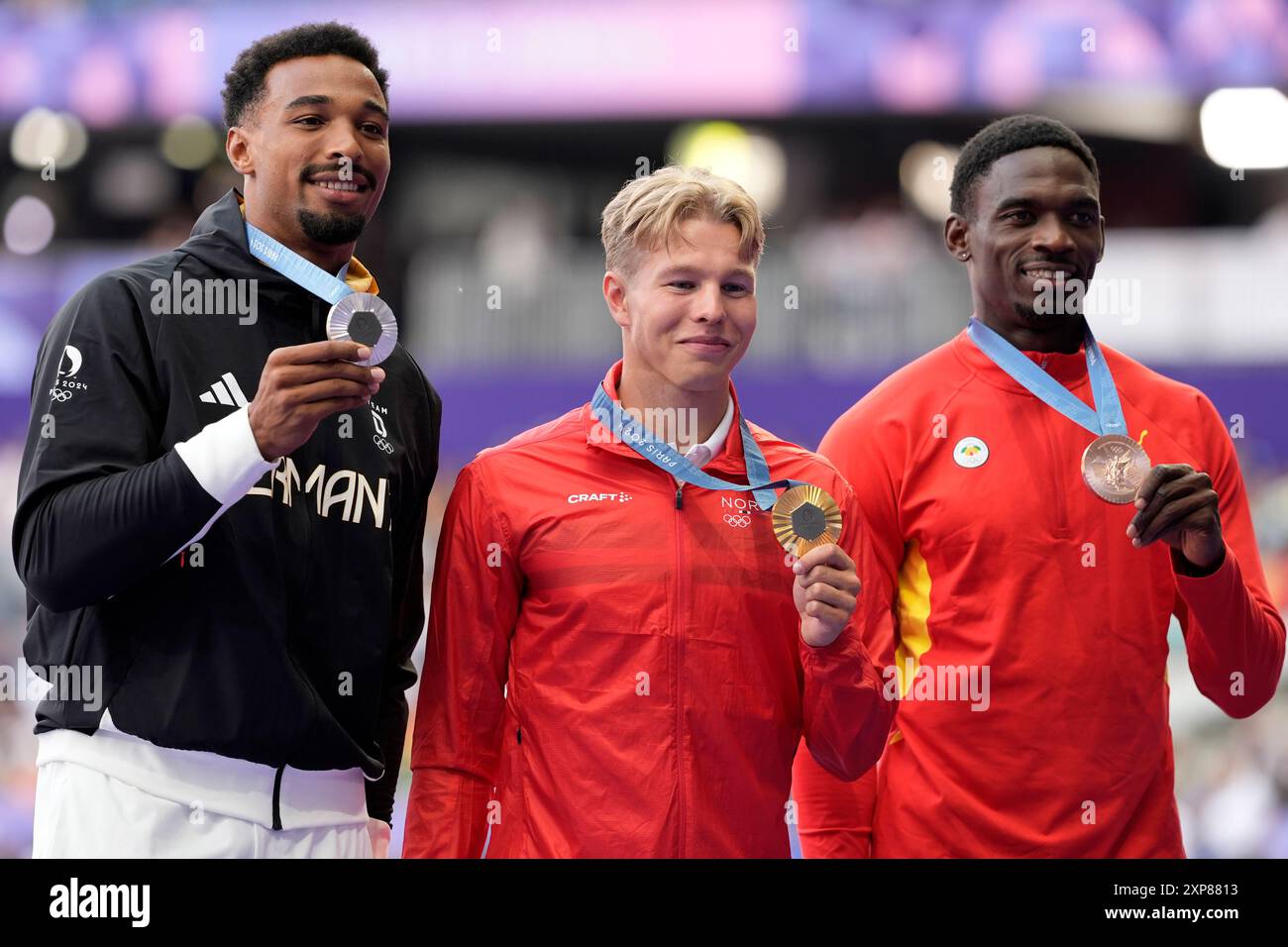 Decathlon gold medalist, Markus Rooth, of Norway, center, stands with ...
