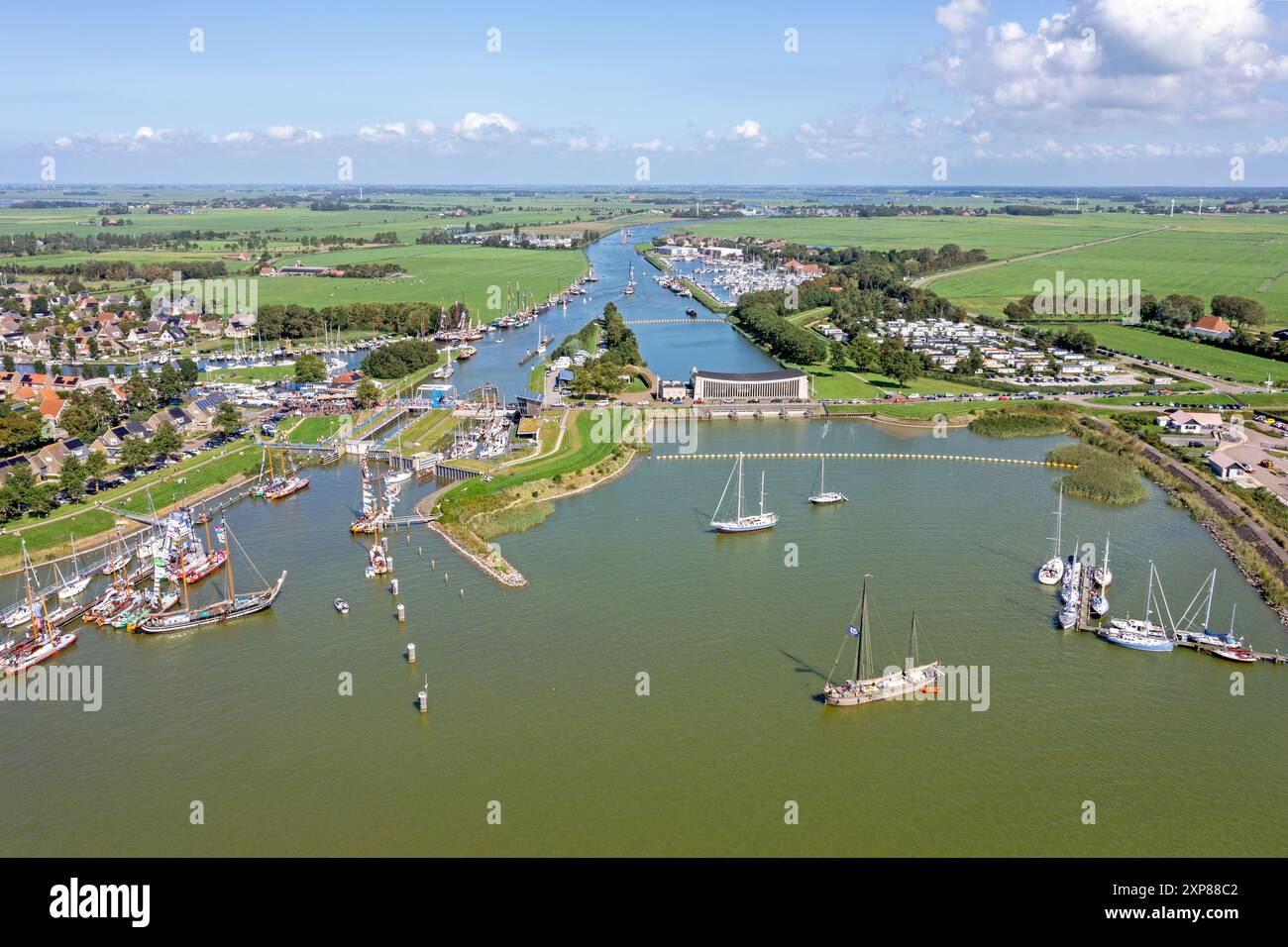 Aerial view from the dutch village Stavoren with sluice, connection ...