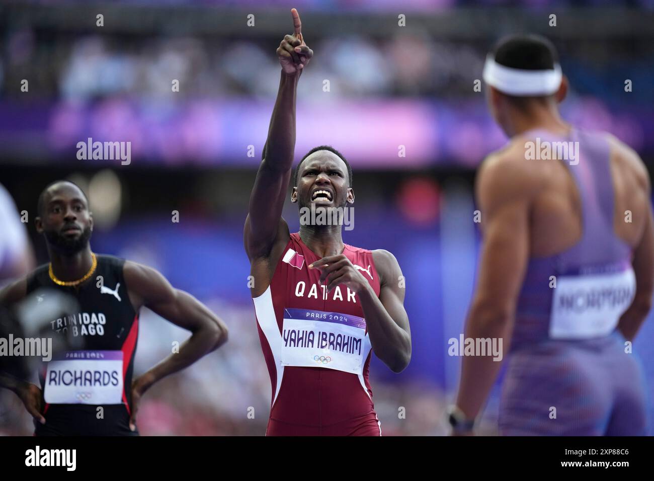 Ammar Ismail Yahia Ibrahim, of Qatar, reacts after competing in a heat ...