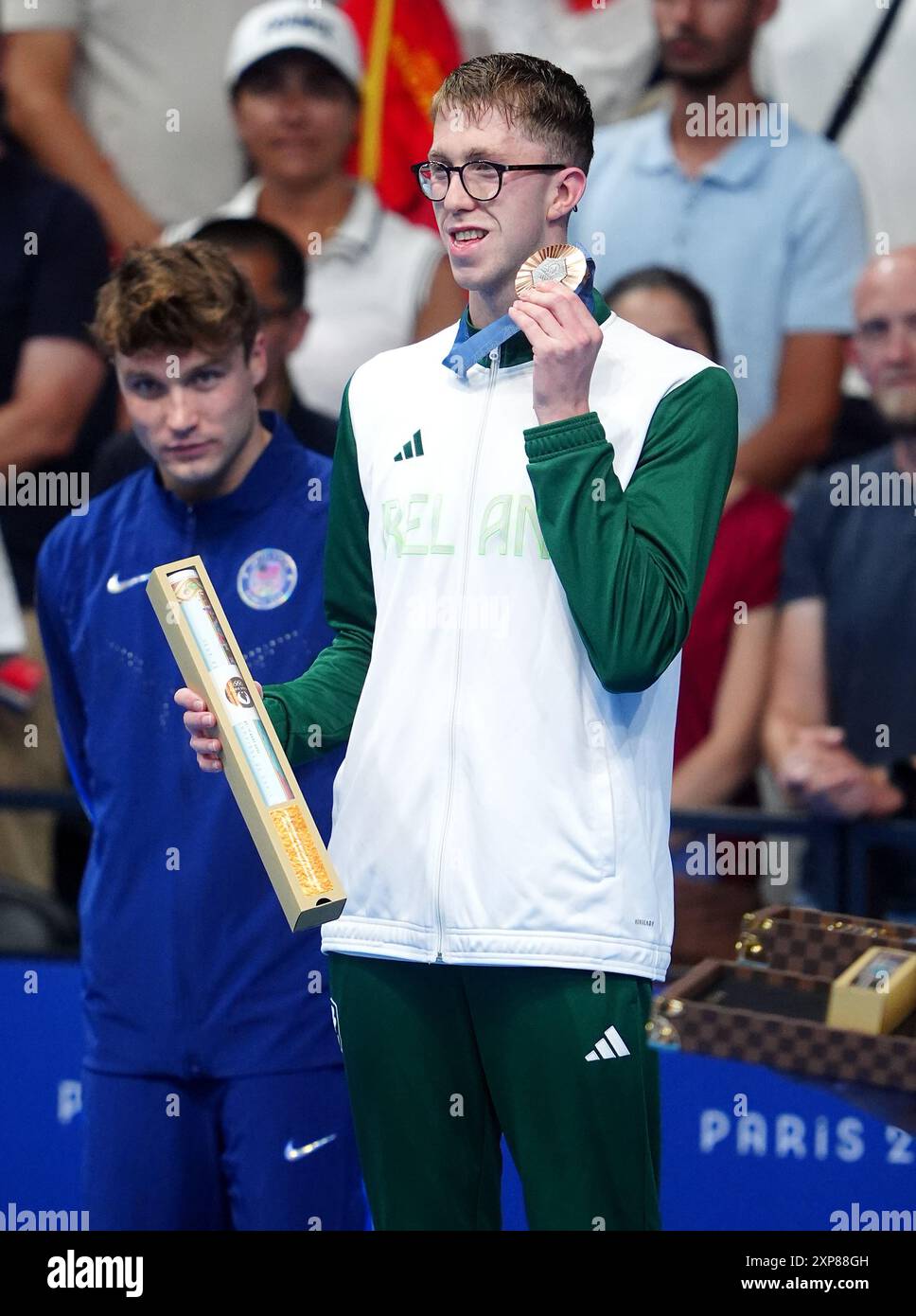 Ireland's Daniel Wiffen celebrates with the bronze medal following the ...