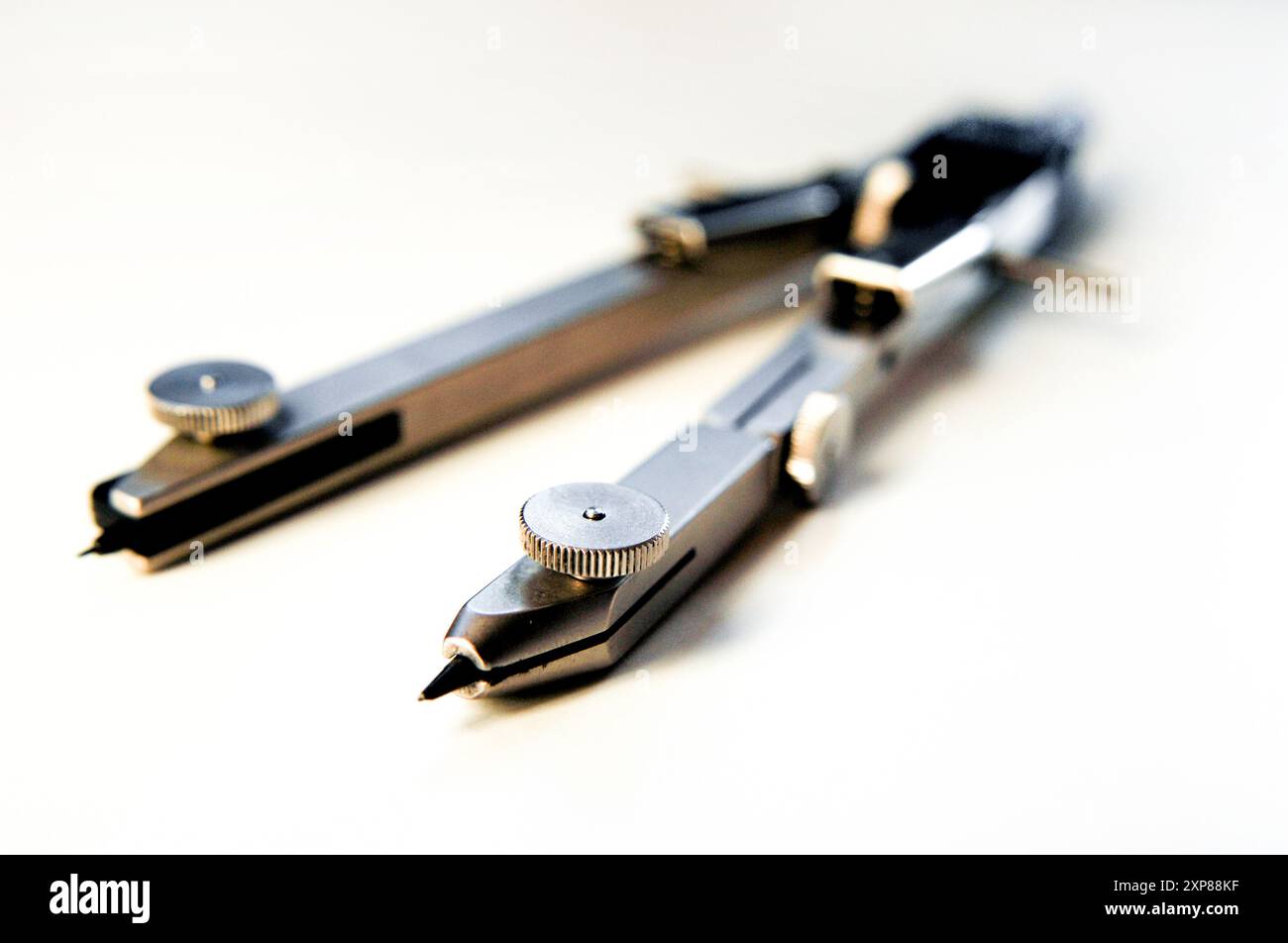 Compass in perspective on white background Stock Photo - Alamy