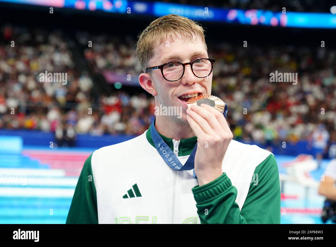 Ireland's Daniel Wiffen celebrates with the bronze medal following the ...