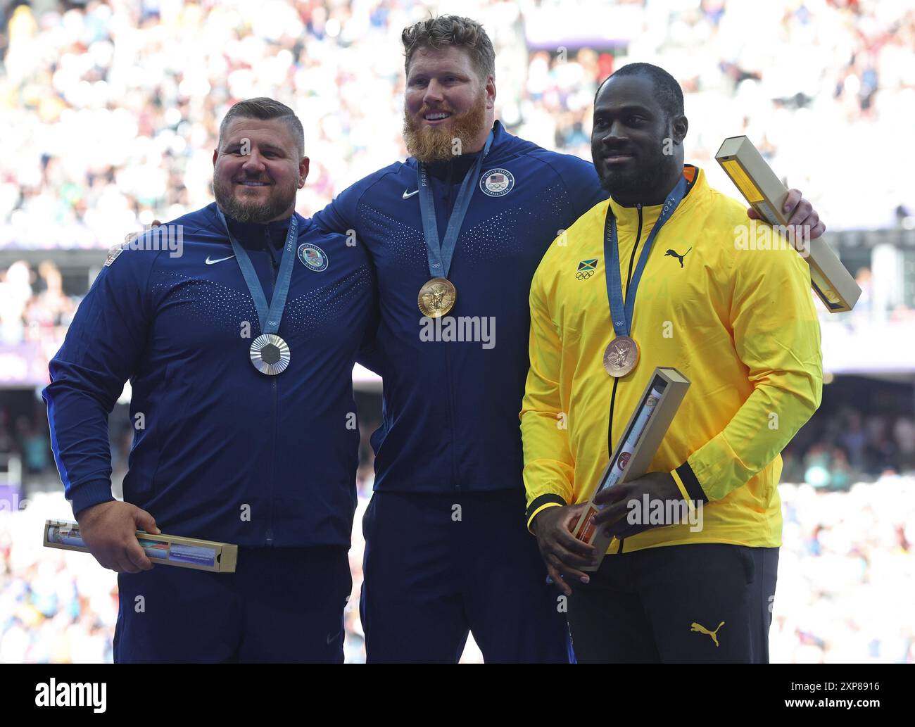 Paris, France. 04th Aug, 2024. Men's Shot Put gold medalist Ryan Crouser of the U.S. (C), silver ...