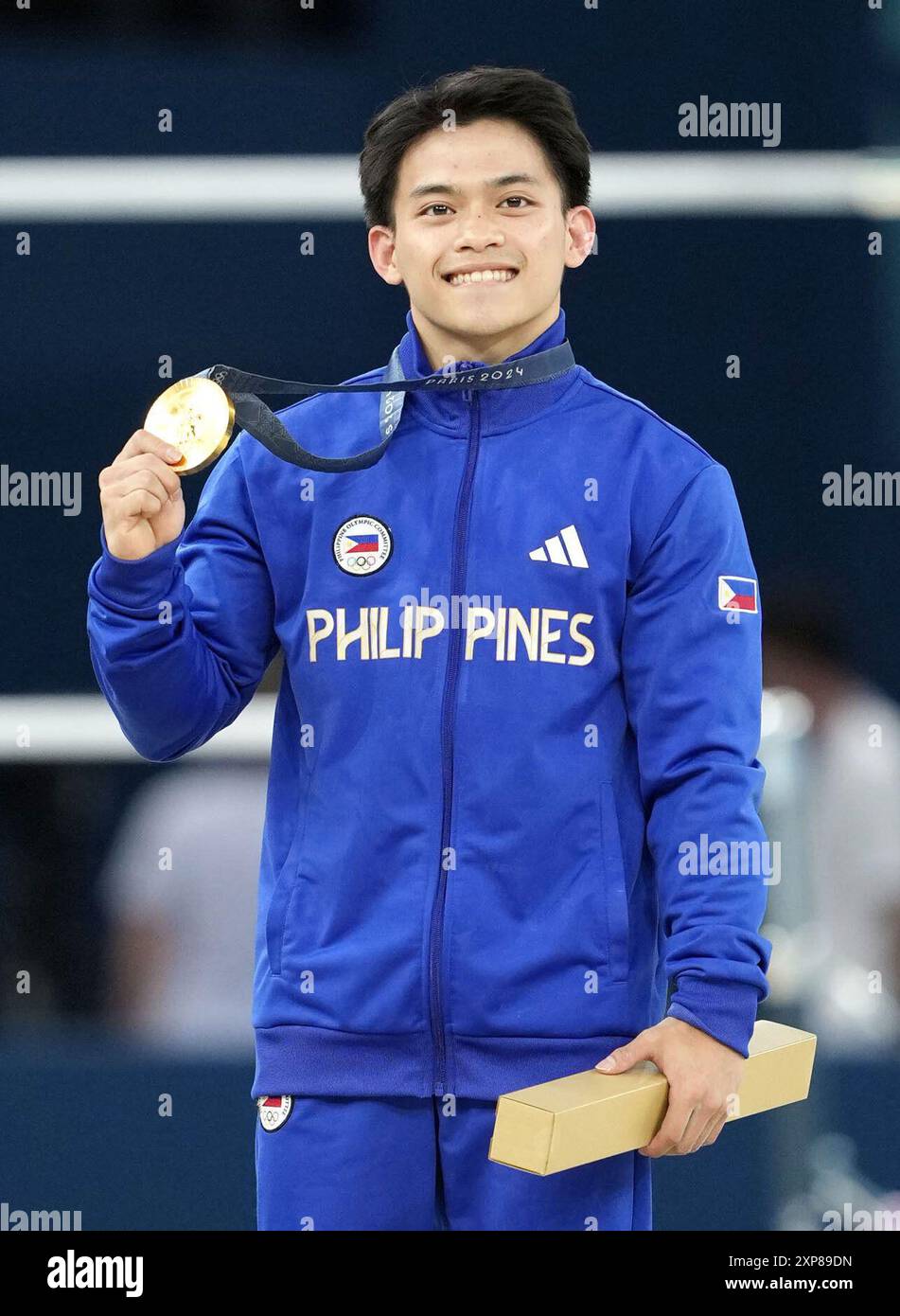Carlos Edriel Yulo of the Philippines poses during the medal ceremony ...