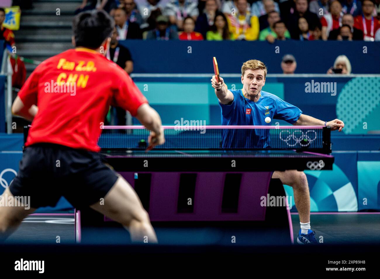 Truls Moregard (SWE) vs. Fan Zhendong (CHN) FRA, Olympische Spiele ...