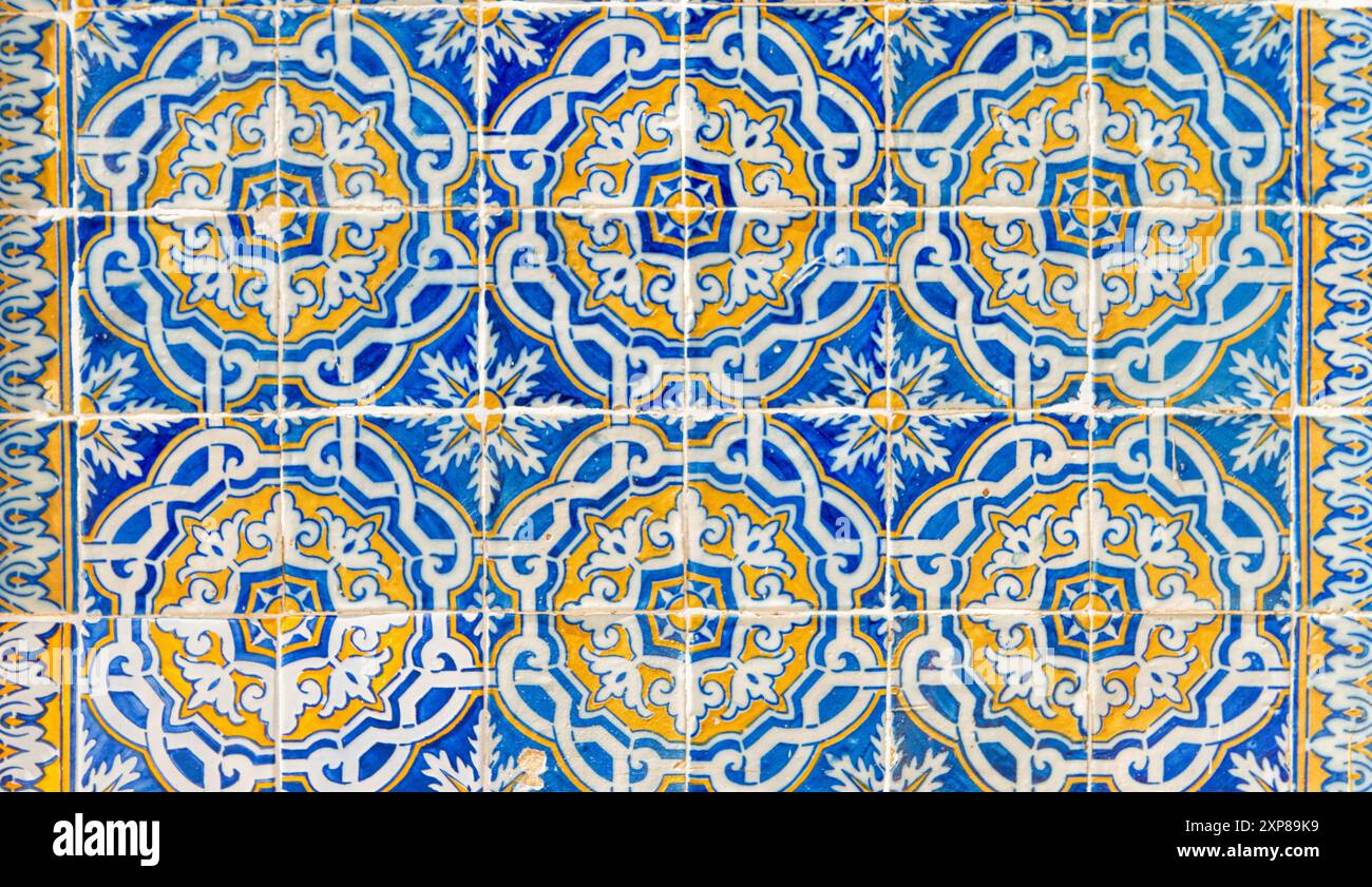 Detail of the traditional tiles from facade of old house. Decorative ...