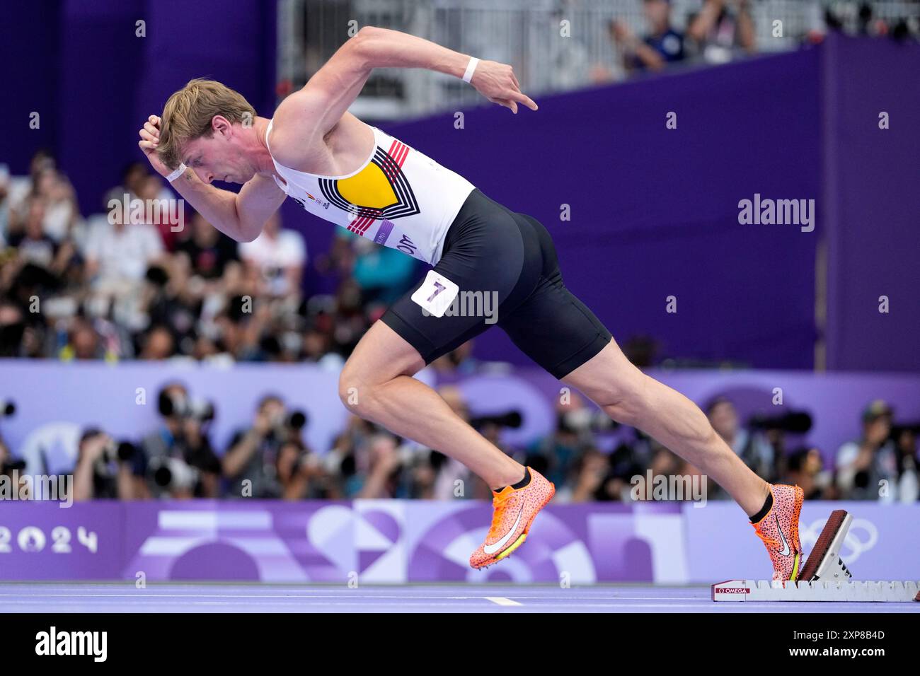 Alexander Doom, of Belgium, competes in the men's 400-meter heats at ...