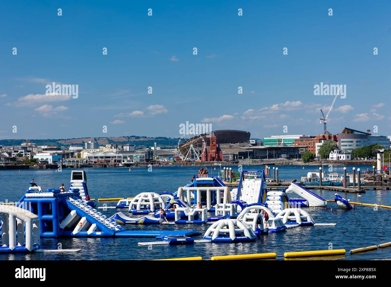 A floating childrens' summer entertainment aqua park in Cardiff Bay ...