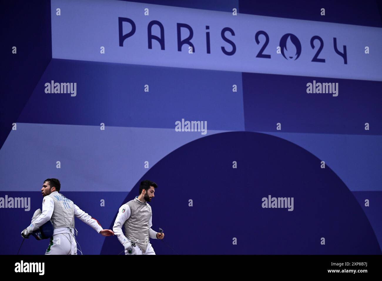 Paris, France. 4th Aug, 2024. Filippo Macchi (L) and Guillaume Bianchi of Italy react during the ...