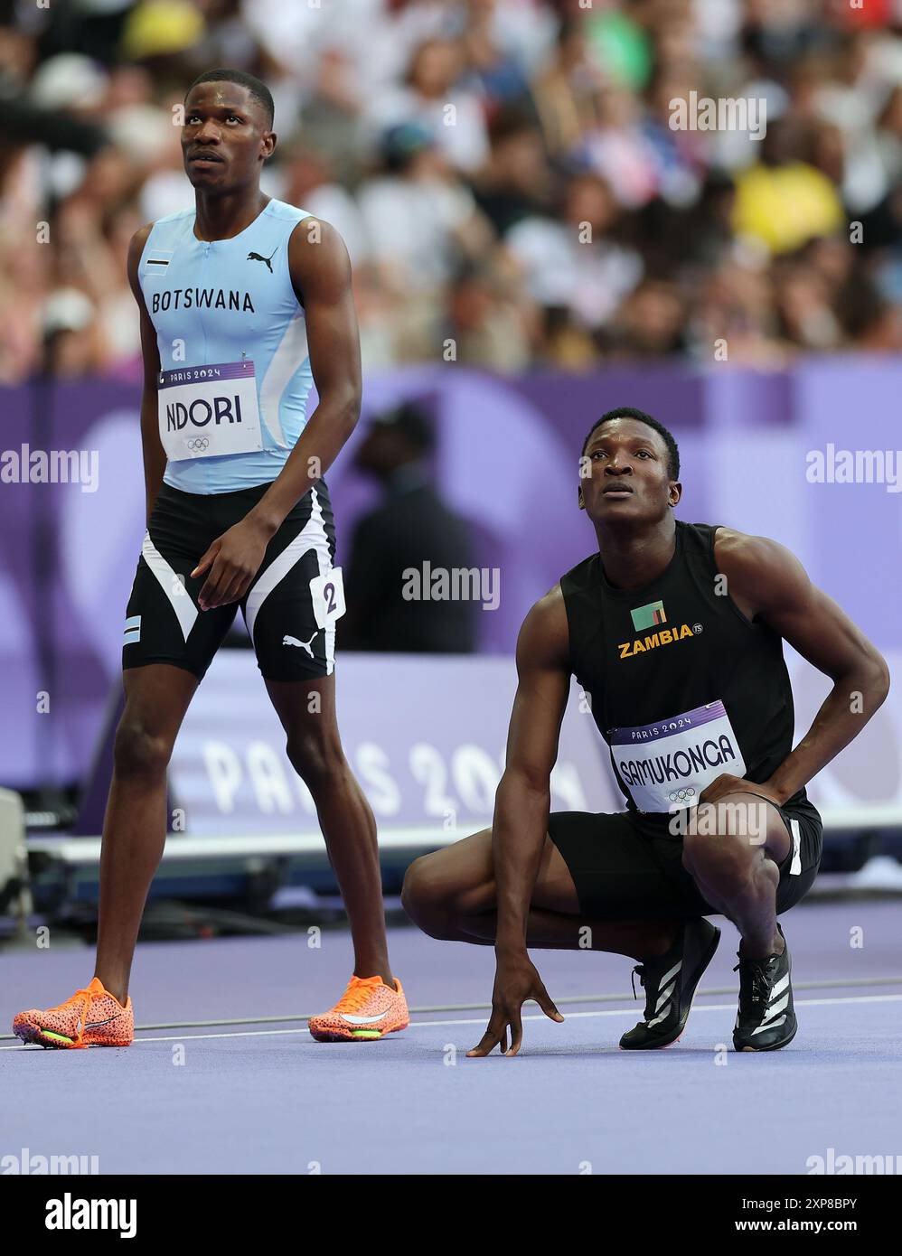 Paris, France. 4th Aug, 2024. Muzala Samukonga (R) of Zambia and Bayapo ...