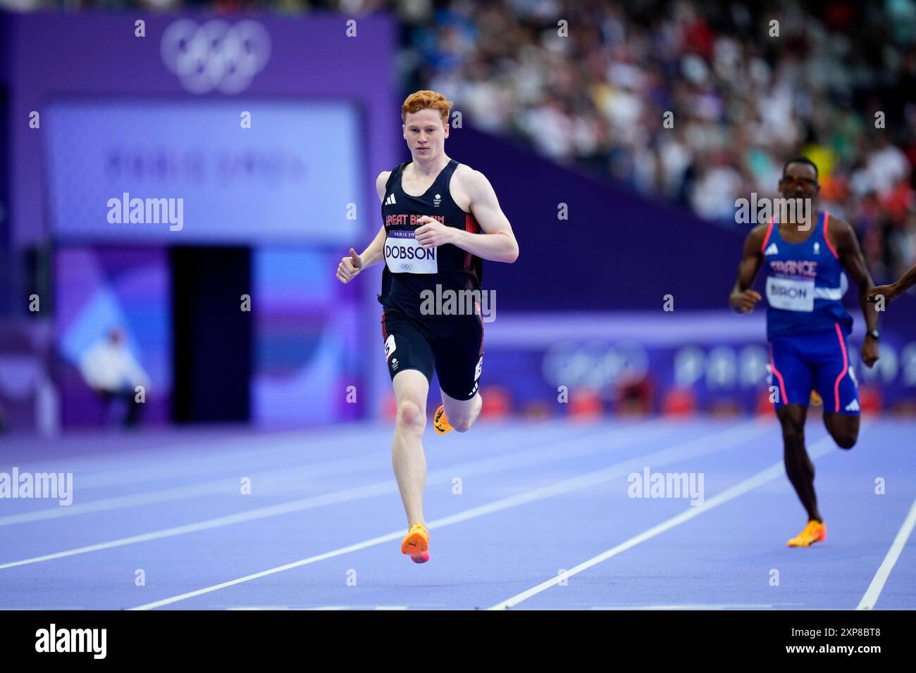 Charles Dobson, of Britain, competes during a heat in the men's 400 ...