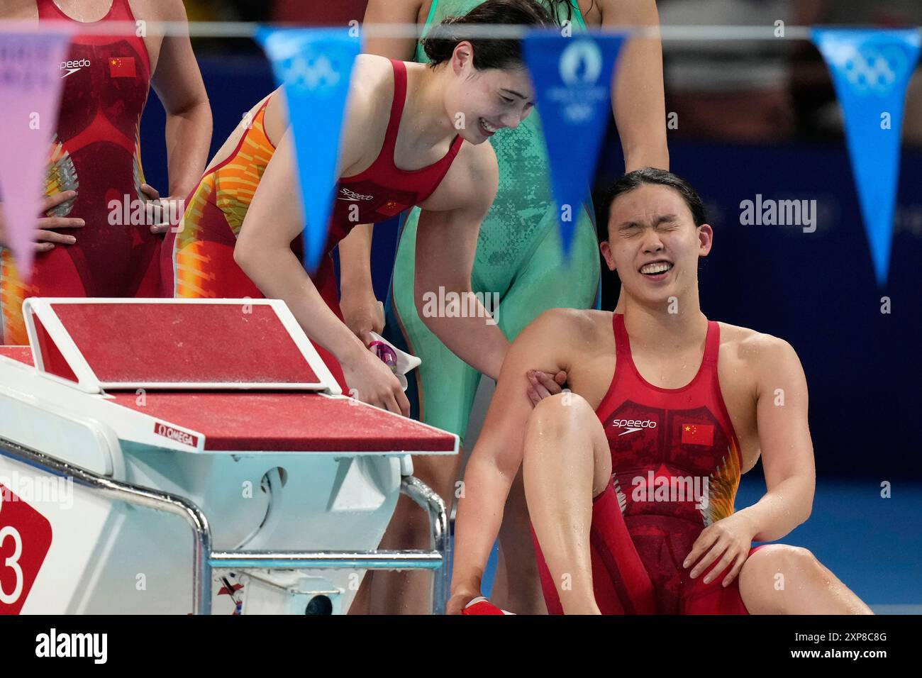 China's Yang Junxuan reacts after finishing third in the women's 4x100-meter medley relay final ...