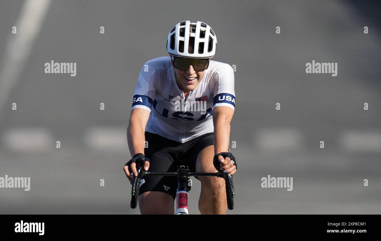 Kristen Faulkner, of the United States, crosses the finish line to win ...