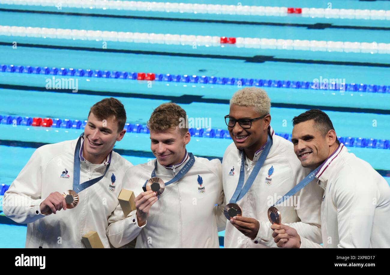 Members of France celebrate during the swimming men's 4 x 100m medley ...