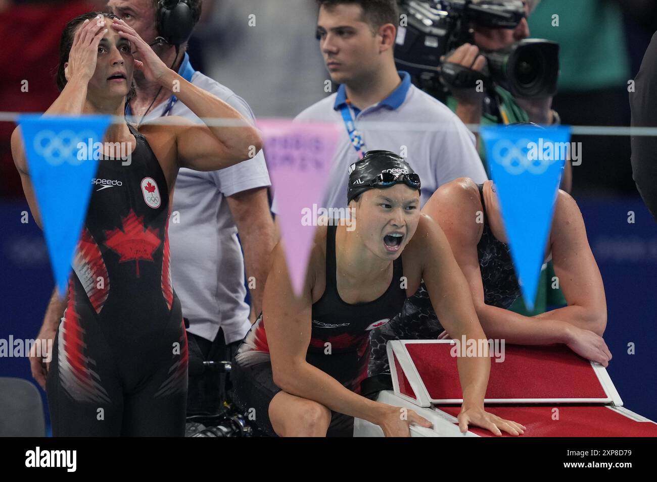 Canada's Kylie Masse (left to right), Maggie Mac Neil and Sophie Angus ...
