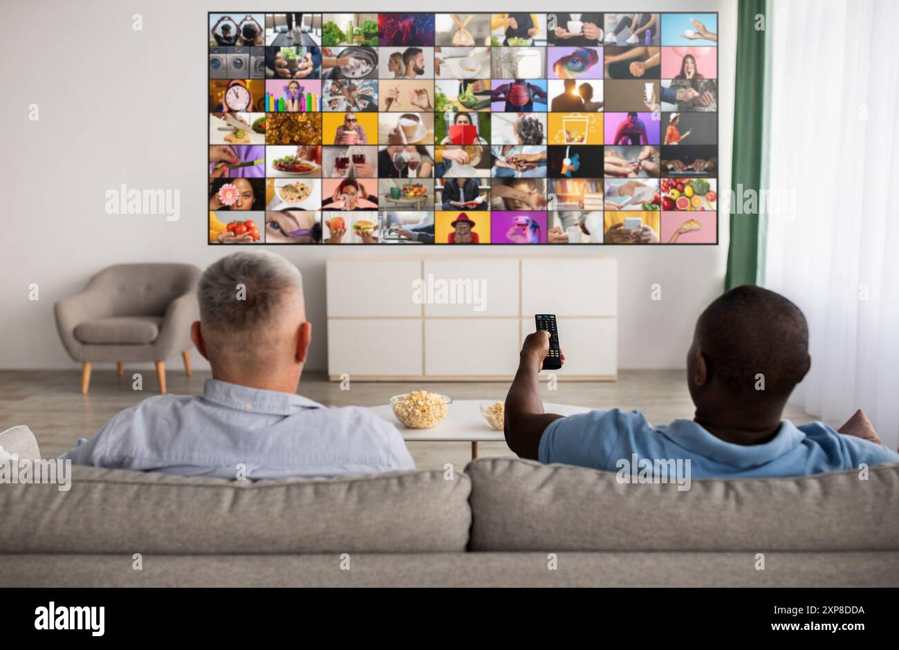 White man sitting on floor watching tv hi-res stock photography and ...