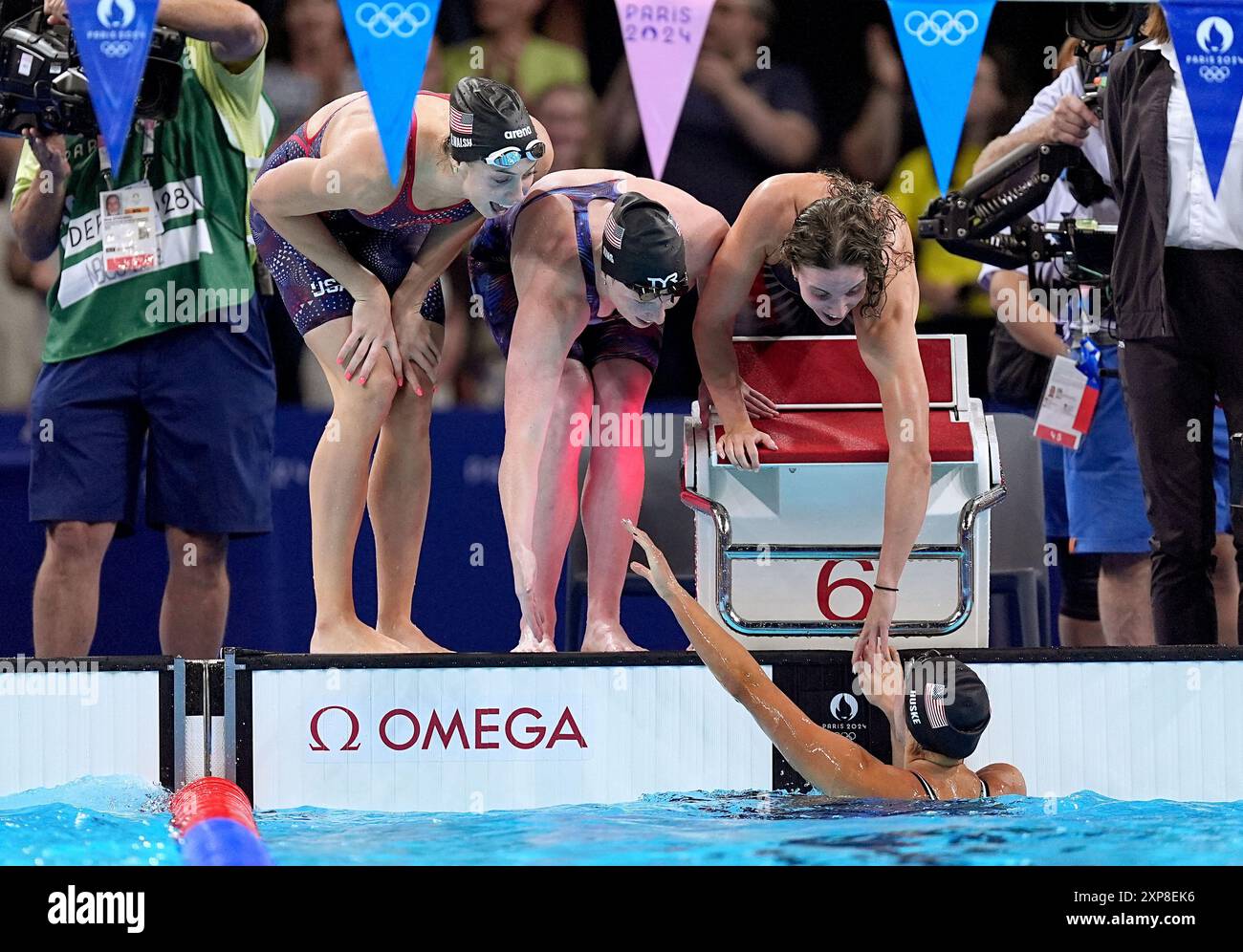 Paris, France. 4th Aug, 2024. Team USA celebrate after the women's 4 x ...
