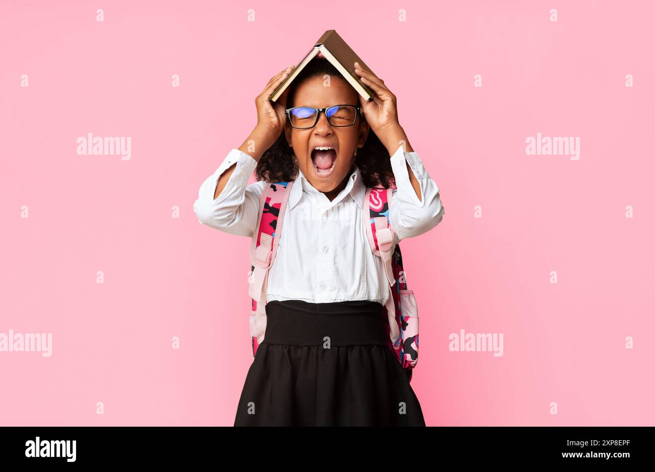 Teen girl covering mouth hi-res stock photography and images - Alamy